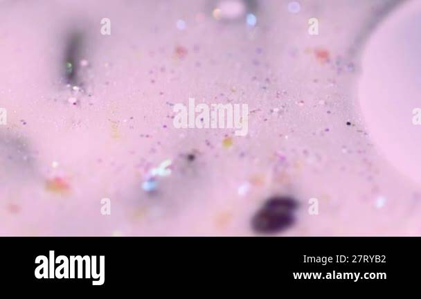 Shimmering emulsion. Shiny fluid. Blur translucent pink purple color ...
