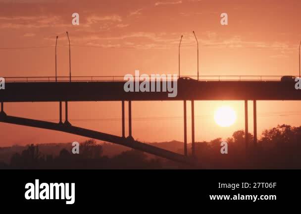 The breathtaking, stunning silhouette of a highway overpass at sunset ...