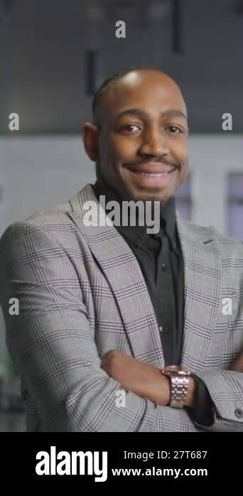 Vertical Screen: Professional man in a business setting, confidently ...