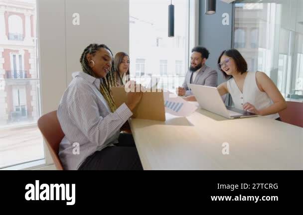 Vibrant workspace where diverse professionals collaborate for success ...