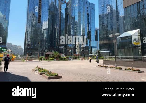 Almaty, Kazakhstan - 12 July, 2024: Vibrant urban area surrounded by ...