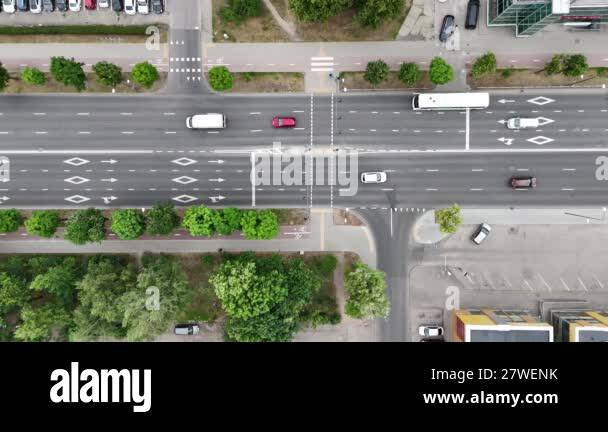 Aerial view of a busy urban intersection with multiple lanes and ...