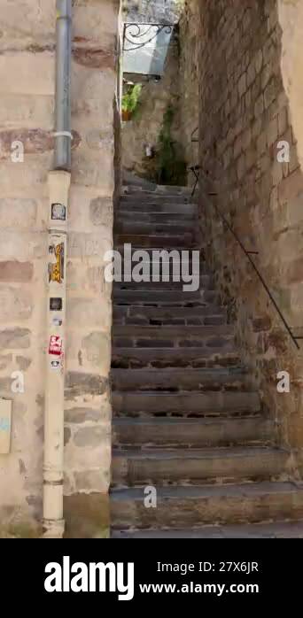 A charming traditional stone house in Kotor, Montenegro, showcasing rustic architecture with a ...