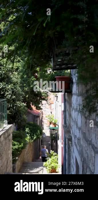 A weathered stone building showcasing a rustic facade, with details ...