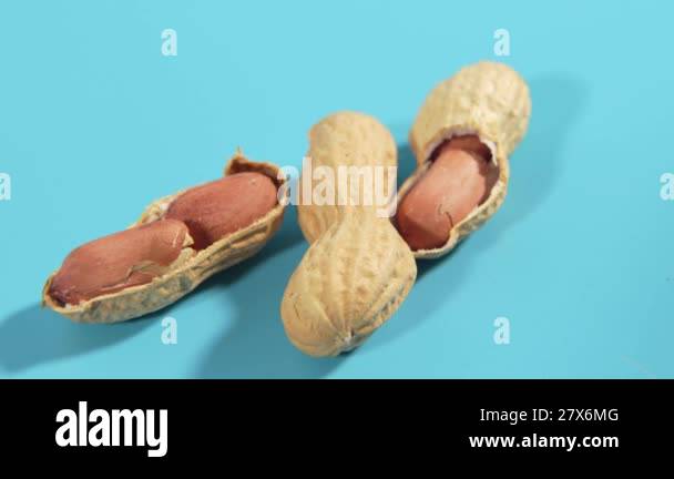 Three peanuts are shown, one of which is revealed. The other two are ...