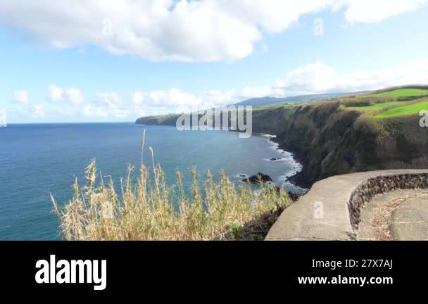 The coastline with cliffs of the island Sao Miguel, Azores. rocks and ...