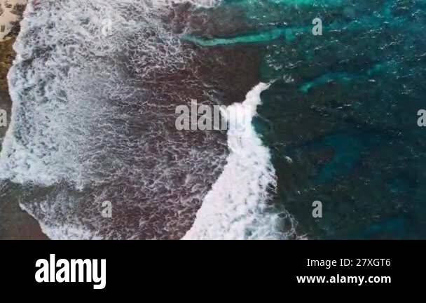 Blue sea wave top view. Waves crashing above drone view. High quality ...