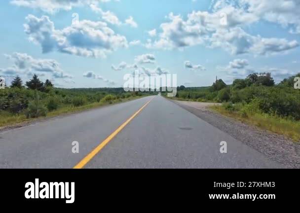 Breathtaking view of a Highway 11 weaving through lush forests. Scenic ...