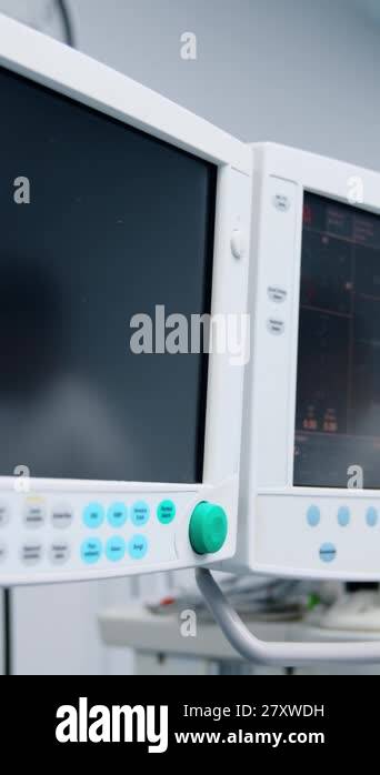 Two monitors of the modern medical equipment in the ward. One screen is ...