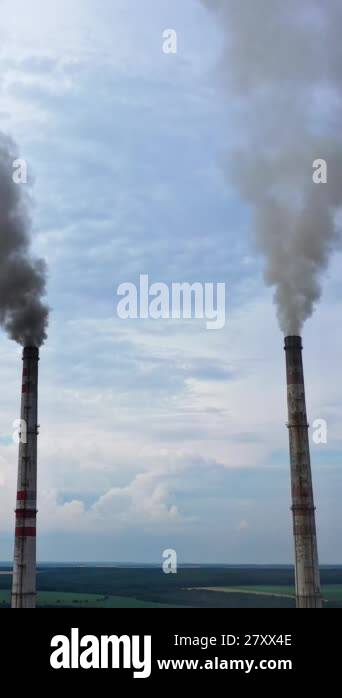 Industrial factory pipes emission gas and smoke. Chimneys with harmful ...
