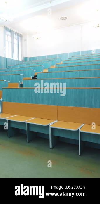 Comfortable classroom without students. Empty auditorium with wooden ...