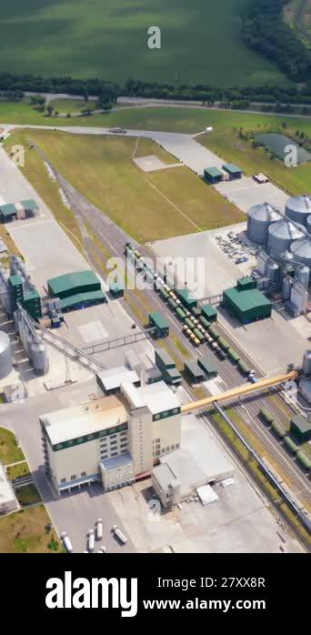 Modern agrocomplex on field. Grain elevators for storing crop. Large ...