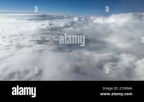 Layers of cumulus clouds, side view from an airplane window Stock Video ...