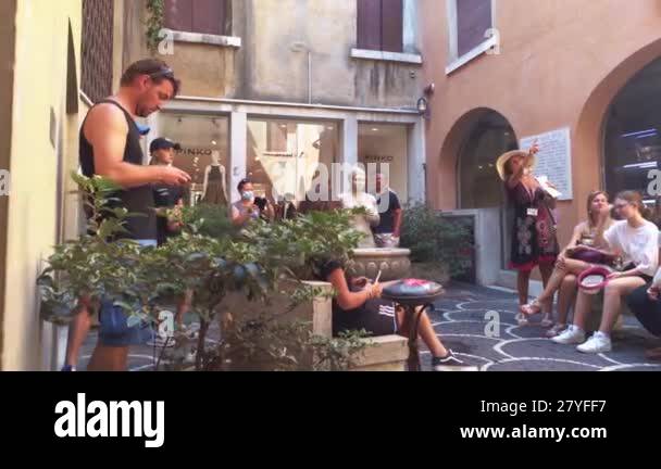 Treviso, Italy 1 January 2025: Tour guide explains local history to a ...