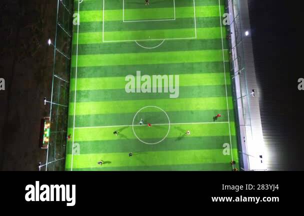 Aerial view of a football match, soccer. Football field and Footballers ...