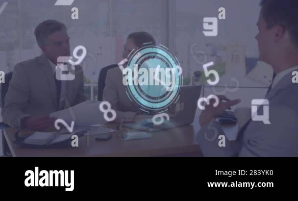 Business professionals in a meeting at the office. They discuss ...