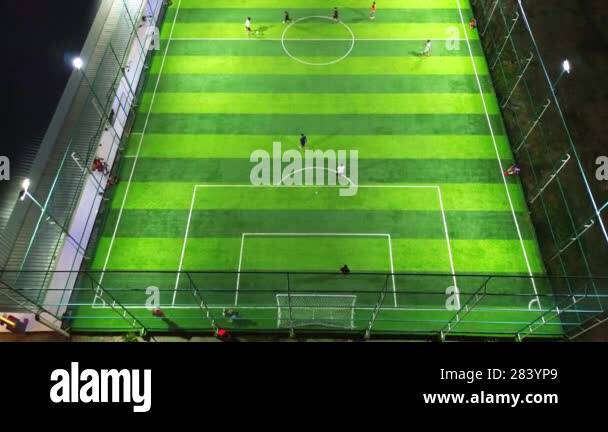 Aerial view of a football match, soccer. Football field and Footballers ...