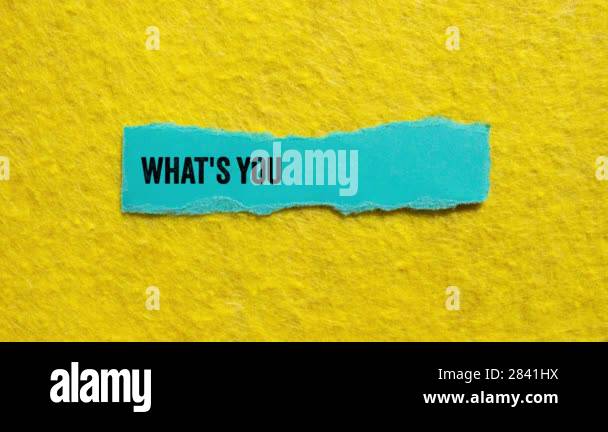 What's your action plan message writing on ripped torn blue paper piece on yellow background ...