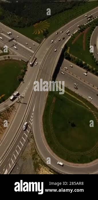 This is a view of a drone flying in city traffic, an aerial view of ...