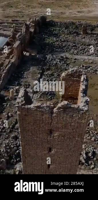 Aerial view of surrounded historic stone ruins, built place among ...