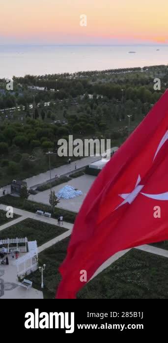 Turkish flag displayed in the park by the sea, national symbols of ...