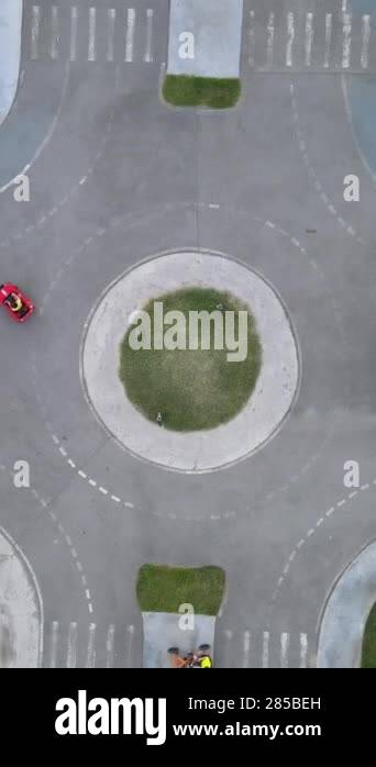 Aerial view of people having fun in the bike area big social park ...