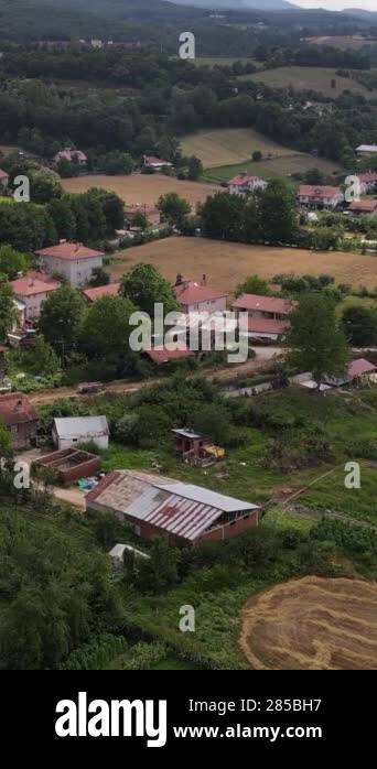 Aerial drone image of a Muslim village built between agricultural lands ...