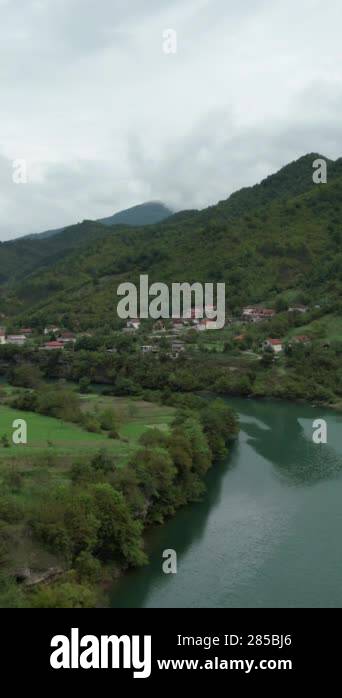 Aerial mountain and river view of a city in jablanica bosnia and ...