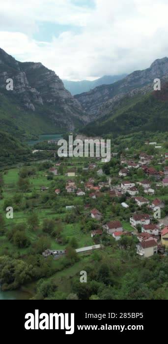 Aerial mountain and river view of a city in jablanica bosnia and ...