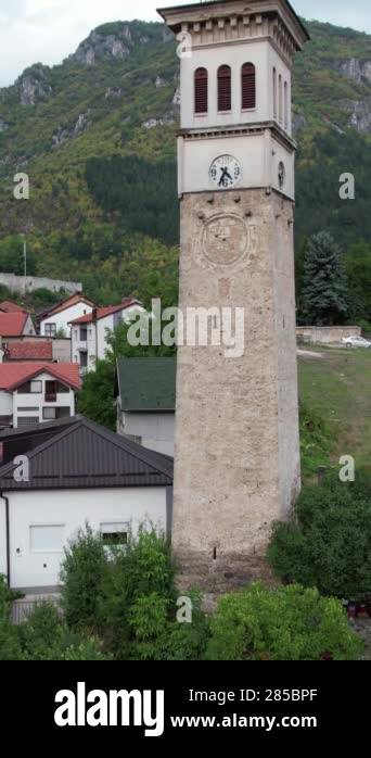 Drone view of clock tower in front of travnik castle historical ...
