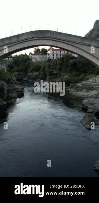 Drone view of Mostar Bridge made of historical stone, an example of ...