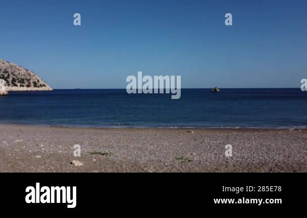 Aerial view of beach and sea by the sea, beautiful day in a bay on the ...