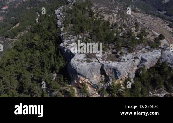 Aerial view by drone of the fields in a canyon towards the valley, view ...