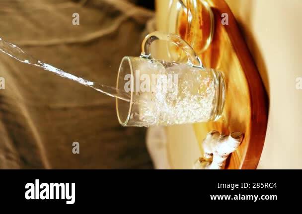 Steaming cup of herbal tea on wooden tray. Cozy atmosphere for winter ...