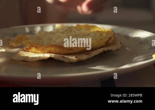 Fried egg arepa Stock Videos & Footage - HD and 4K Video Clips - Alamy