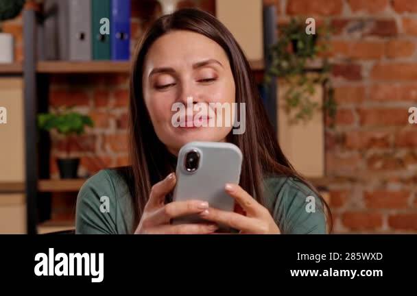 Business employee working at office. Young business woman sitting at ...
