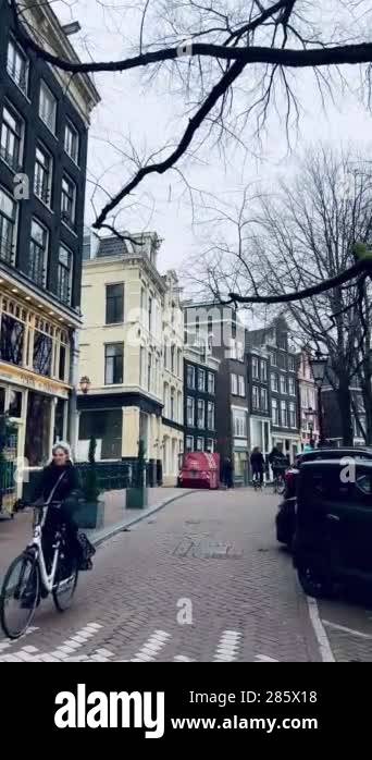 Amsterdam downtown - Amstel river, old houses and a bridge. Nice view ...