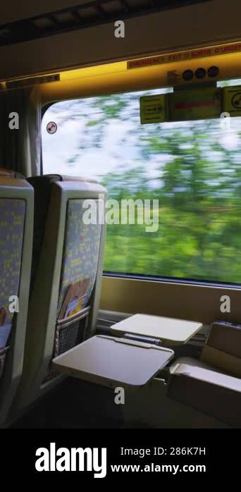 Passenger window seats in a fast first class intercity Via Rail train ...