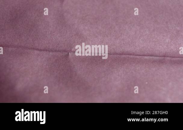 Texture of crumpled maroon paper with rough wrinkles on cardboard sheet ...