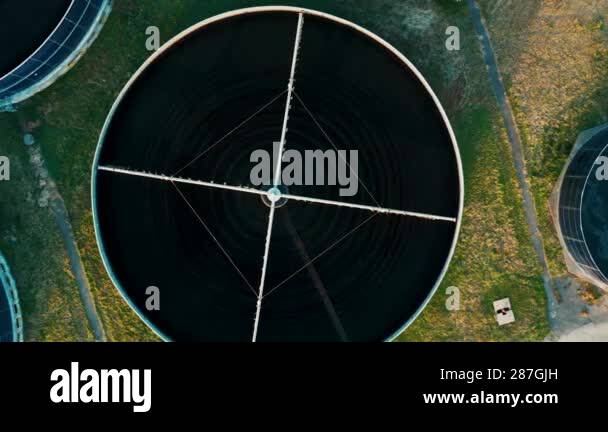 Close up aerial view of circular sedimentation tank at wastewater ...