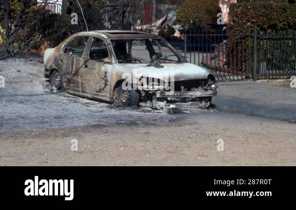 A close-up of a burned-out car in Pasadena, California, USA, on January ...