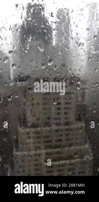 New York City high-rises in a rainy, foggy panorama, captured in a ...