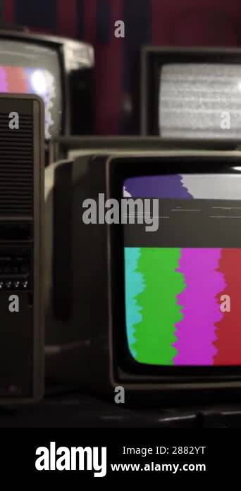Retro TV Displaying Green Screen in Close Up with Stacked TVs ...