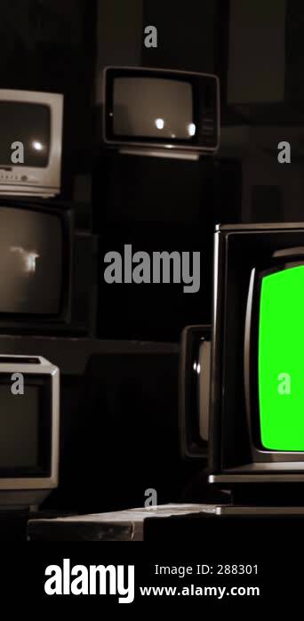 Old Television with Green Screen Chroma Key Surrounded by Vintage TVs ...