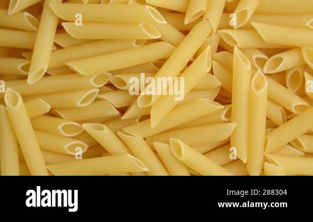 Raw Italian Pasta , Spinning. Penne Rigate. Top View Stock Video ...
