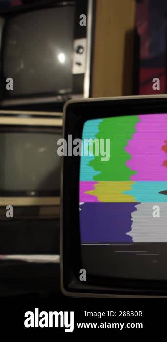 Vintage TV Displaying Green Chroma Key Surrounded by Antique Televisions - Vertical 4K, Ending ...
