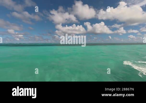 4k video of fluffy clouds and turquoise waters near Punta Cana ...