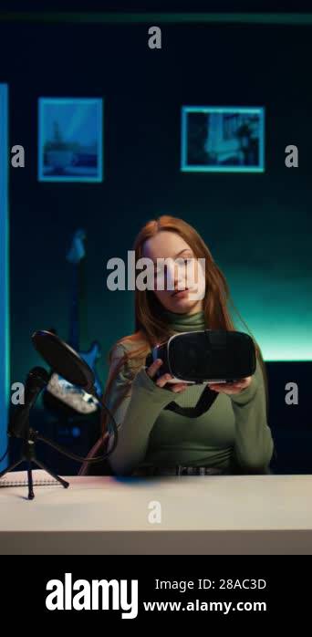 Vertical video Tech specialist filming sponsored content, unboxing ...