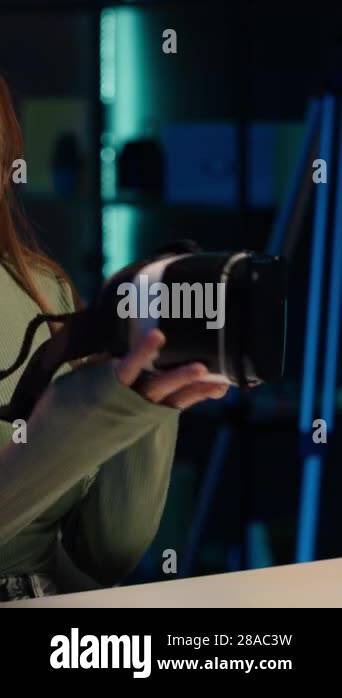 Vertical video Tech specialist filming sponsored content, unboxing ...