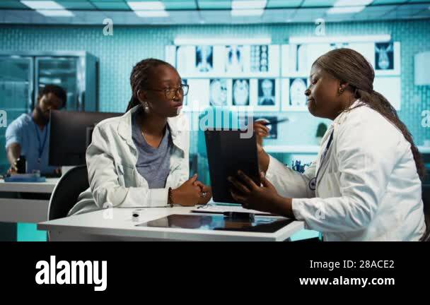 Doctor conducting a patient consultation in a professional medical ...